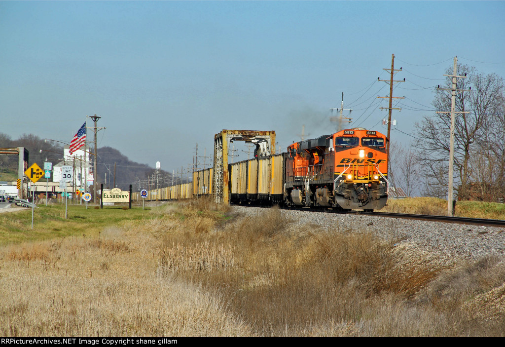 BNSF 5813 works SB out of the siding.